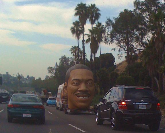Ftw Eddie Murphys Head Entertains La Commuters Meet Dave To Out Suck Love Guru