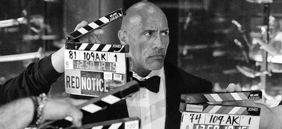 'Red Notice' First Look Has The Rock Looking Dapper